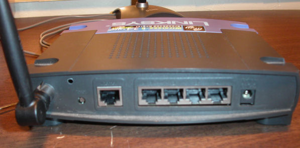 How to add an external D-Link antenna to a Linksys WRK54G router